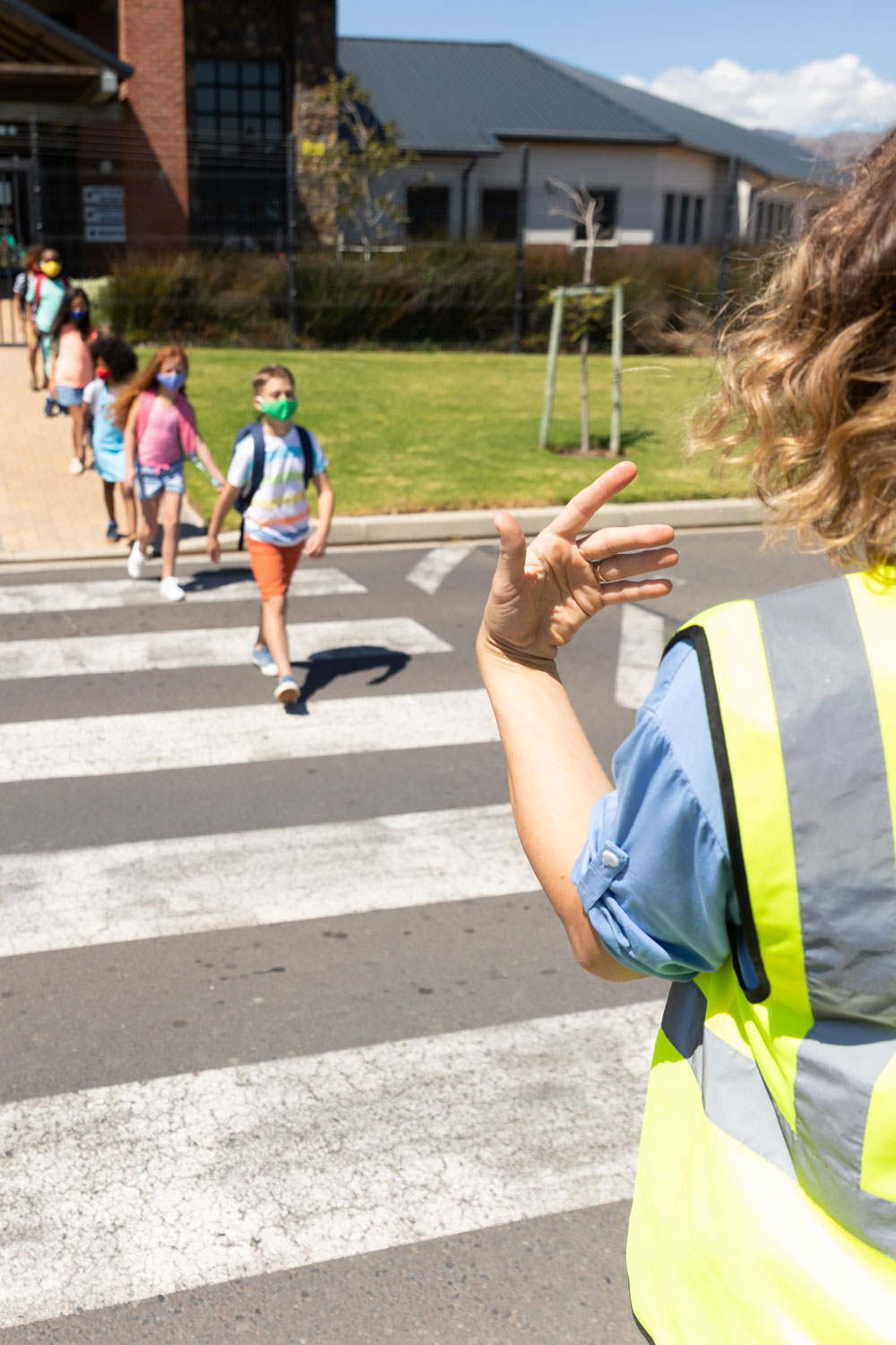 Group of Kids Wearing Face Masks Crossing the Road - Public Policy ...