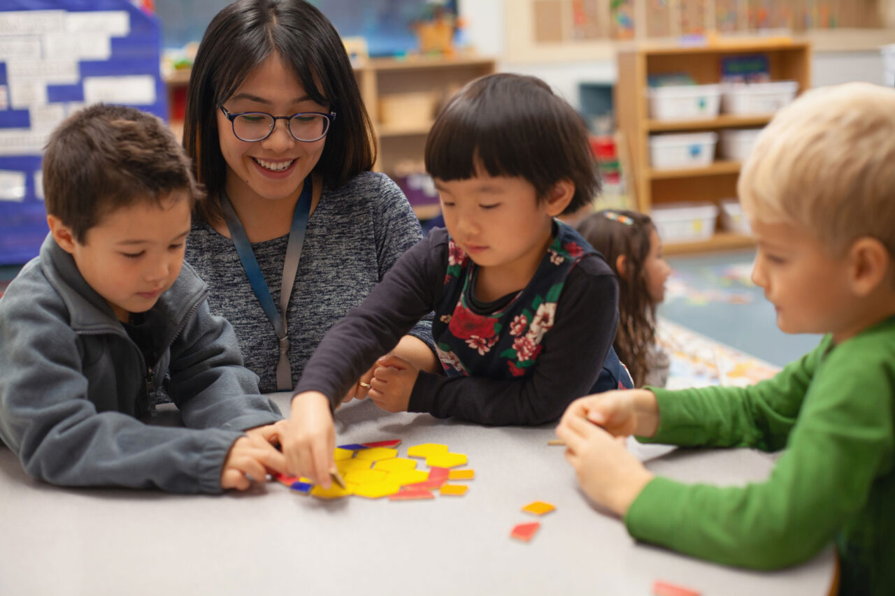 Teacher with Multiracial Preschool Kindergarten Students Learning with ...